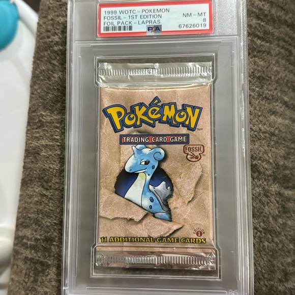 Games | 1999 Wotc Pokmon Fossil 1st Edition Booster Pack Psa 8 | Poshmark